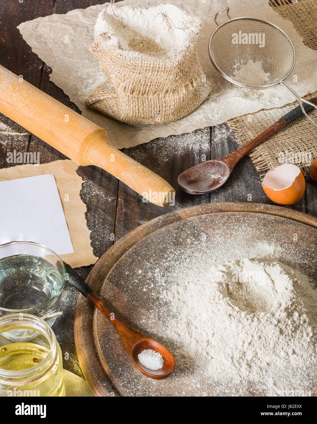 Ingredients for cooking dough or bread. Bunch of white rye flour. Dark ...