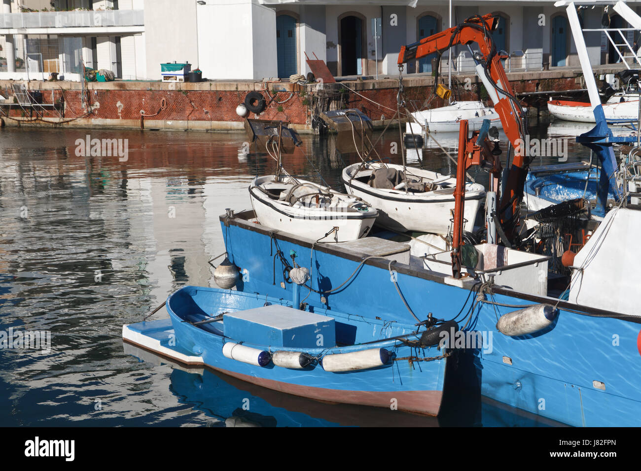 harbor dock fishing port boat salt water sea ocean water italy rowing ...