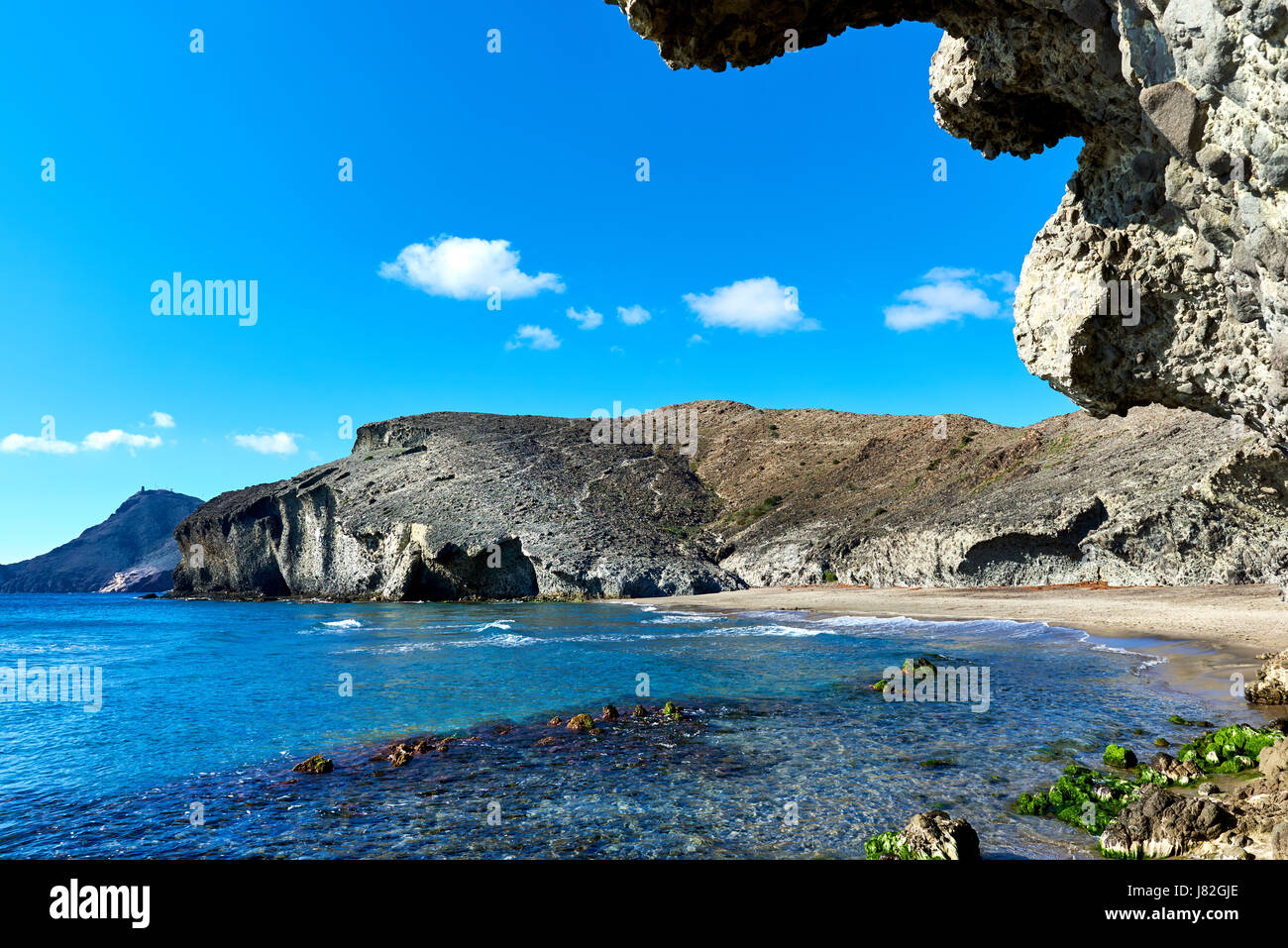 Volcanic rock-formations at Playa de Monsul. Famous beach in the Cabo ...