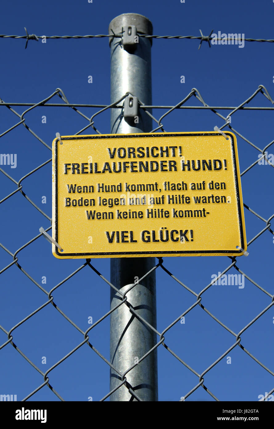 sign signal wait waiting blue dog caution barrier fence fence in ...