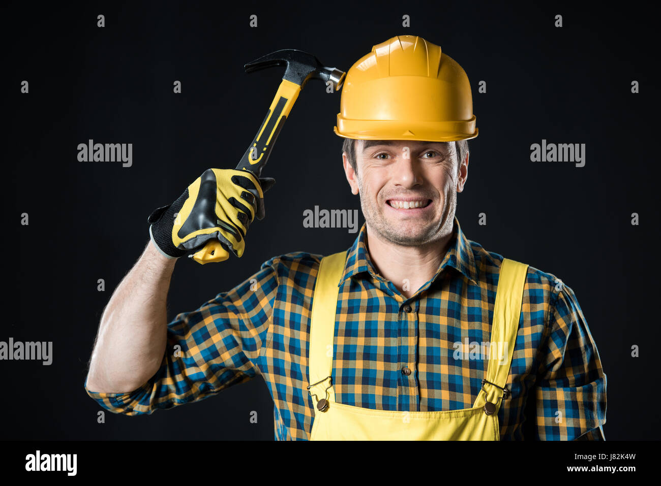 Laborer on helmet hammer hi-res stock photography and images - Alamy