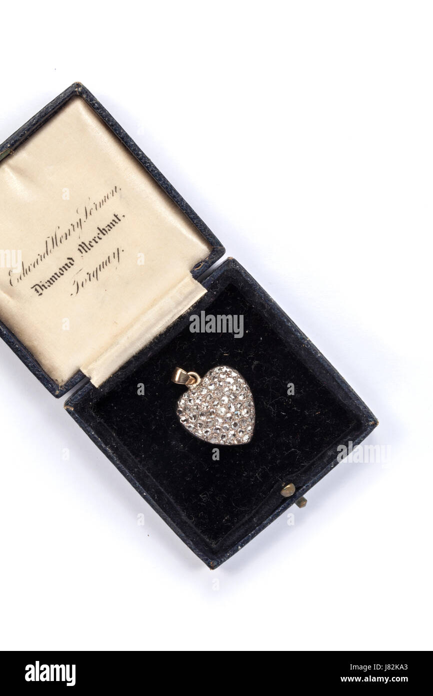 Diamond heart shaped locket in case Stock Photo - Alamy