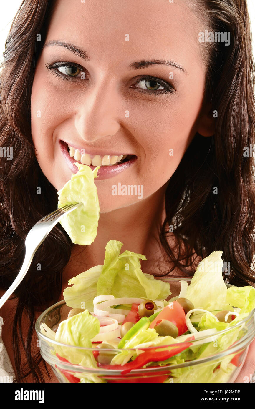 woman female brown brownish brunette vegetable diet eating eat eats ...