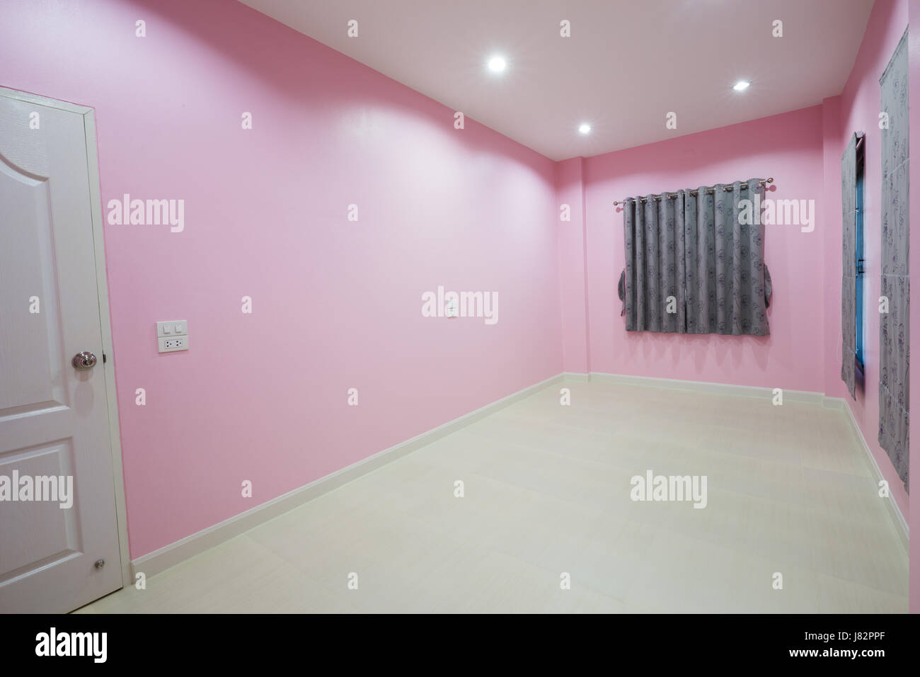 empty pink room with door and window in home Stock Photo - Alamy