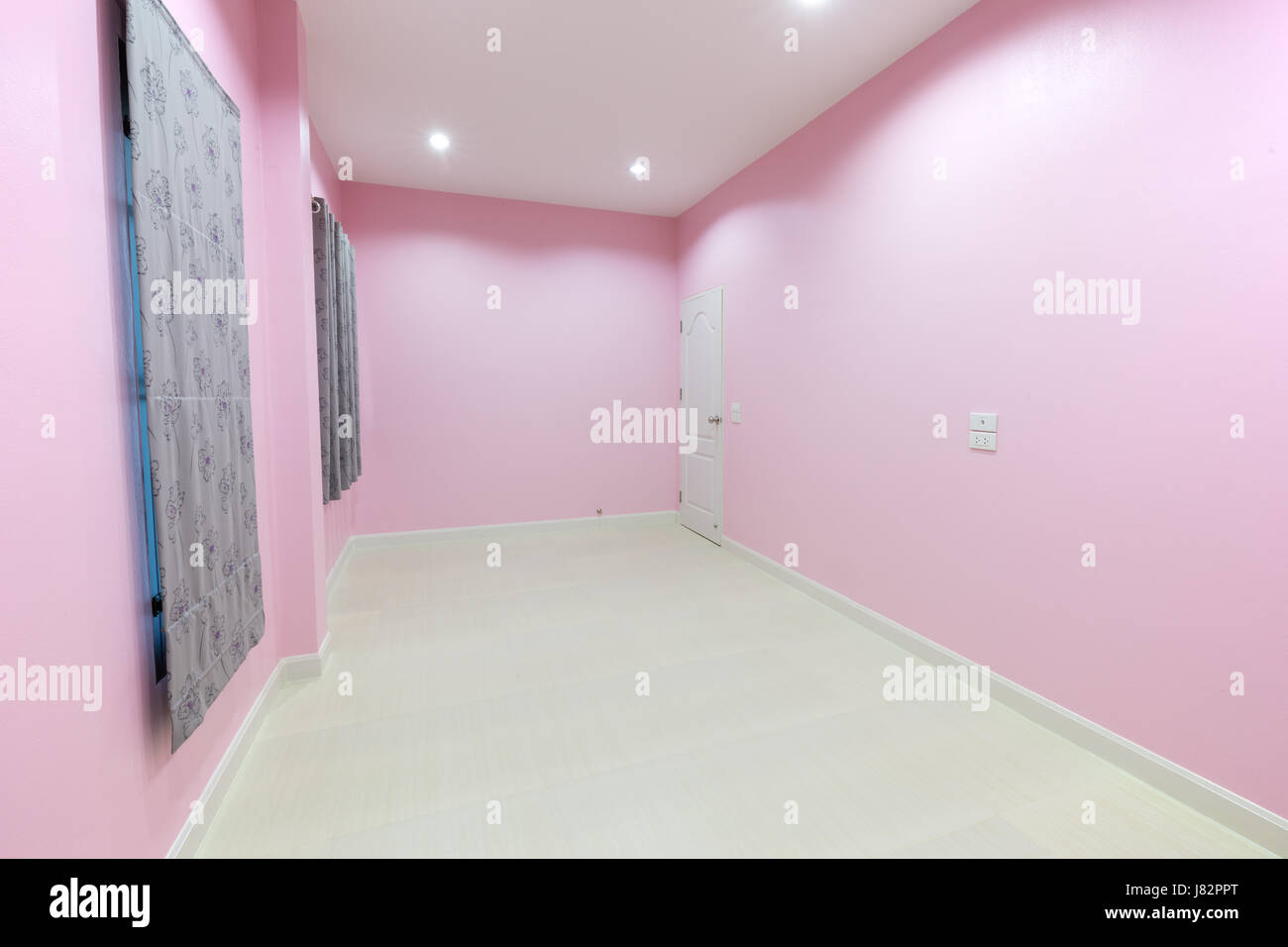 empty pink room with door and window in home Stock Photo - Alamy
