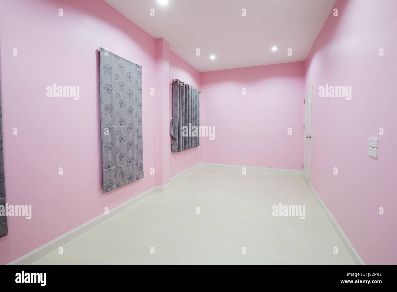 empty pink room with door and window in home Stock Photo - Alamy