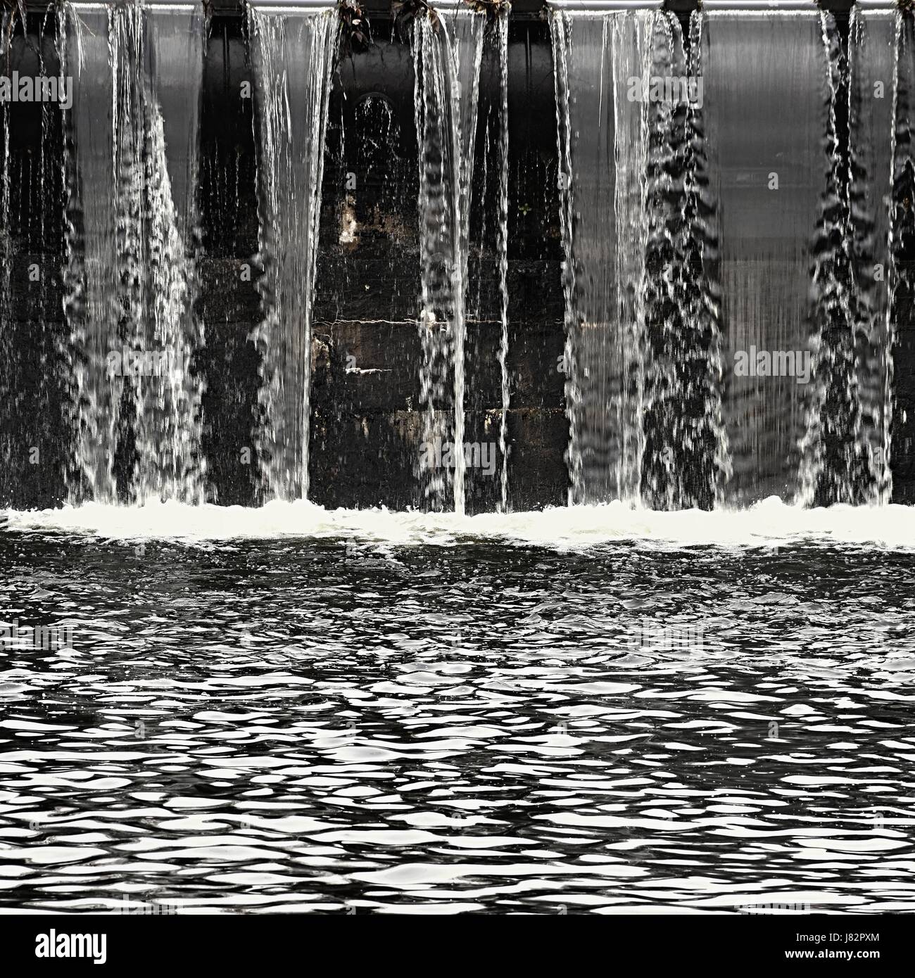 Weir - sluice on the river Stock Photo - Alamy