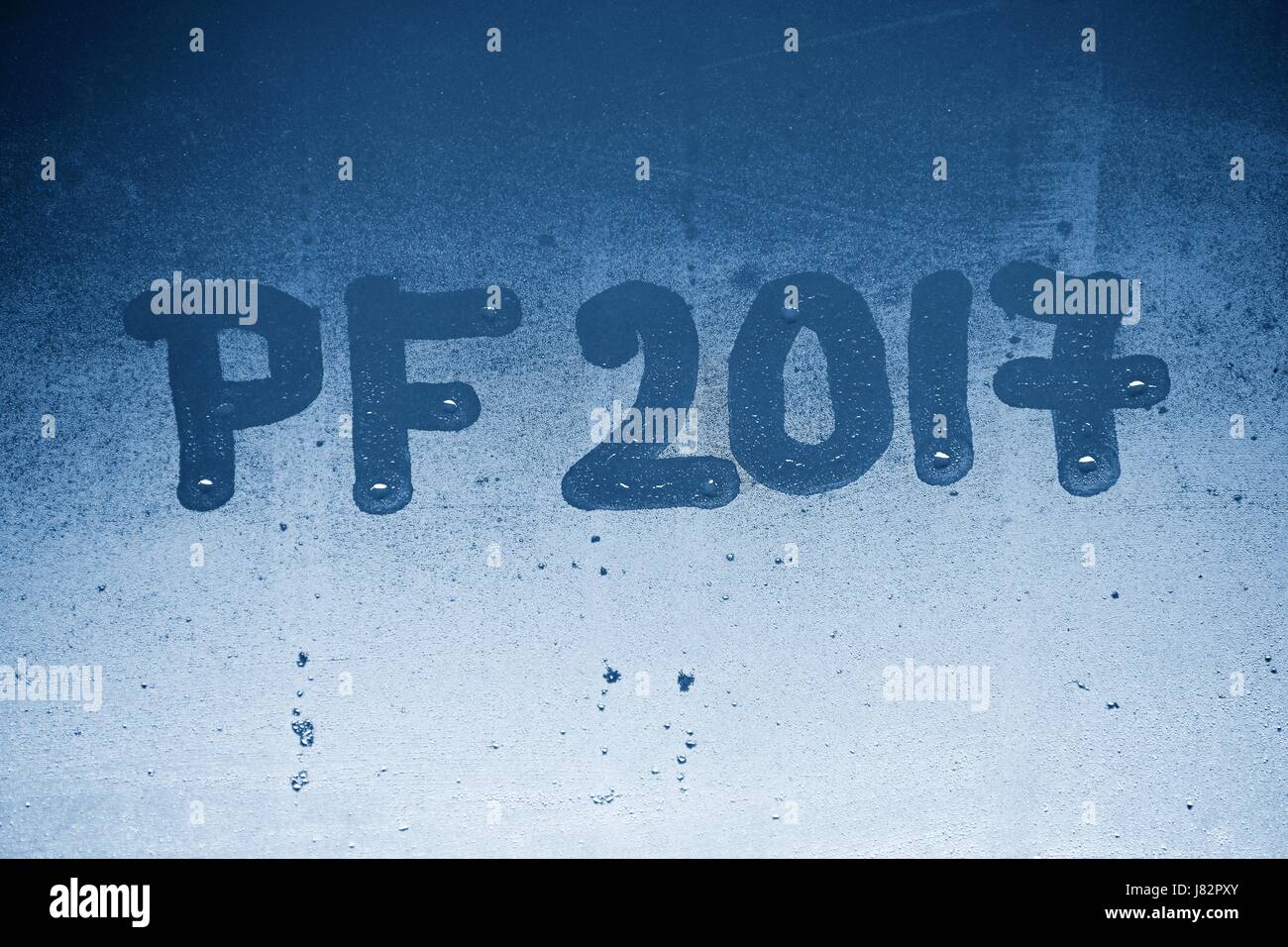 PF 2017 written on a misty window. Background for the celebration of ...