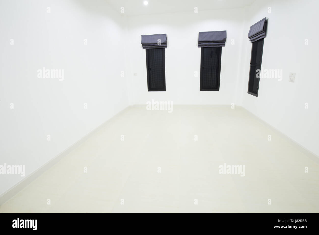 empty white room with window in home Stock Photo - Alamy
