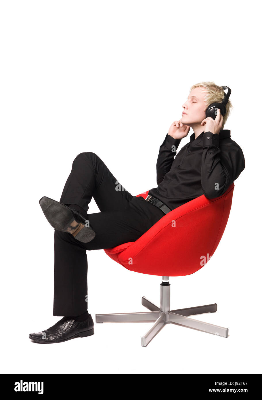 telephone phone armchair listen single music male masculine human human ...