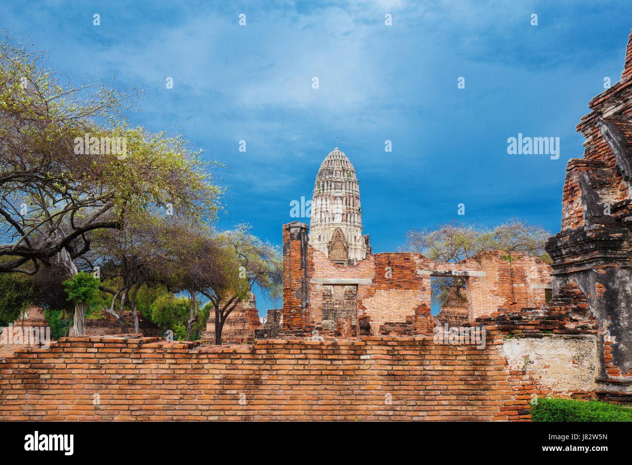 Ruins of buddha statues and pagoda of Wat Ratcha Burana temple in ...
