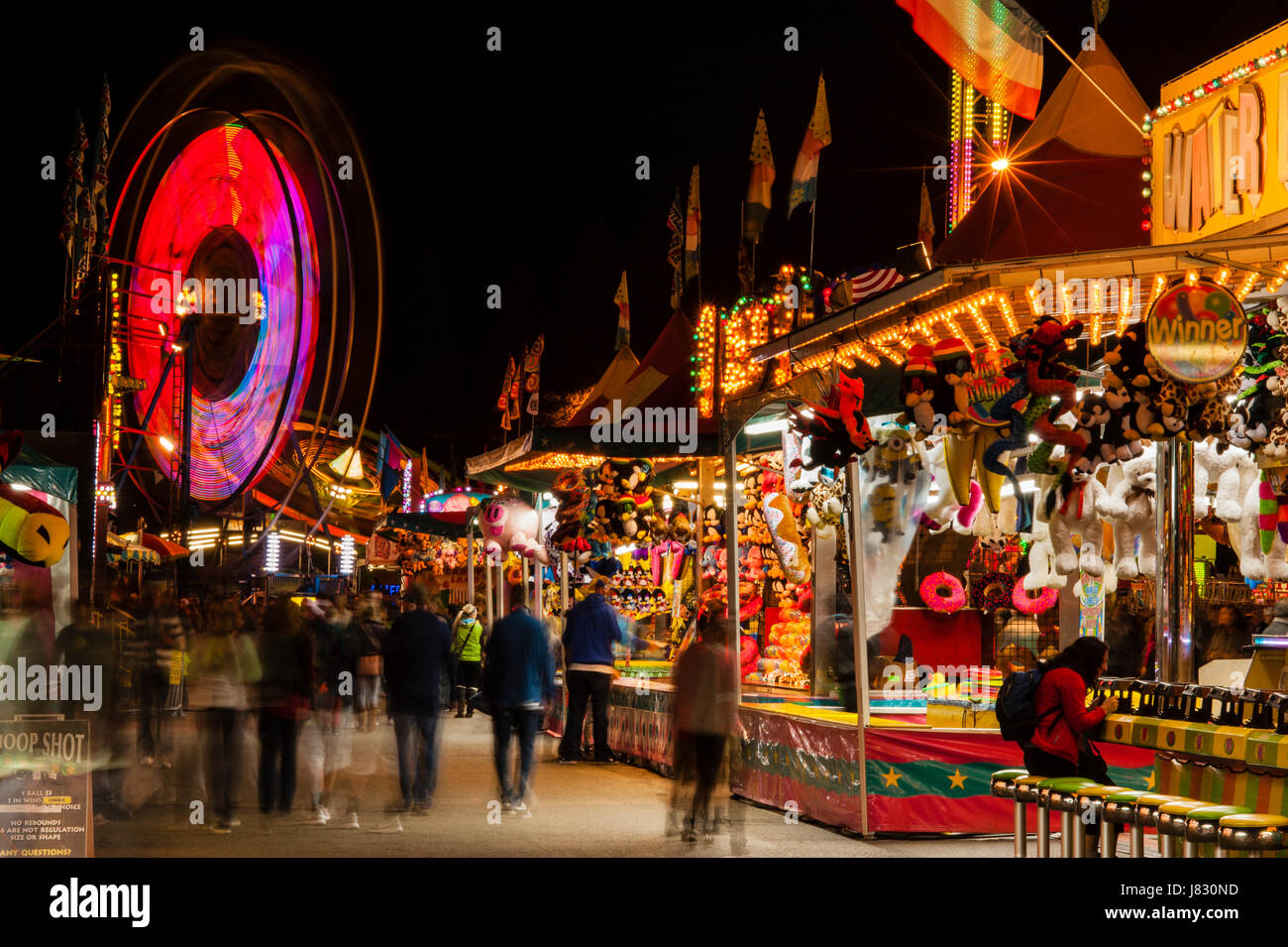 Evergreen State Fair at twilight with game booths at night Monroe ...