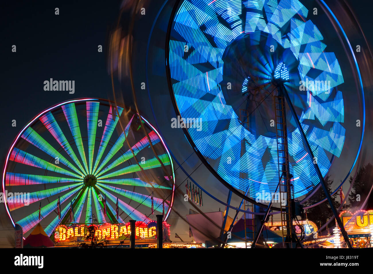 Spinning wheel fair ground ride hi-res stock photography and images - Alamy