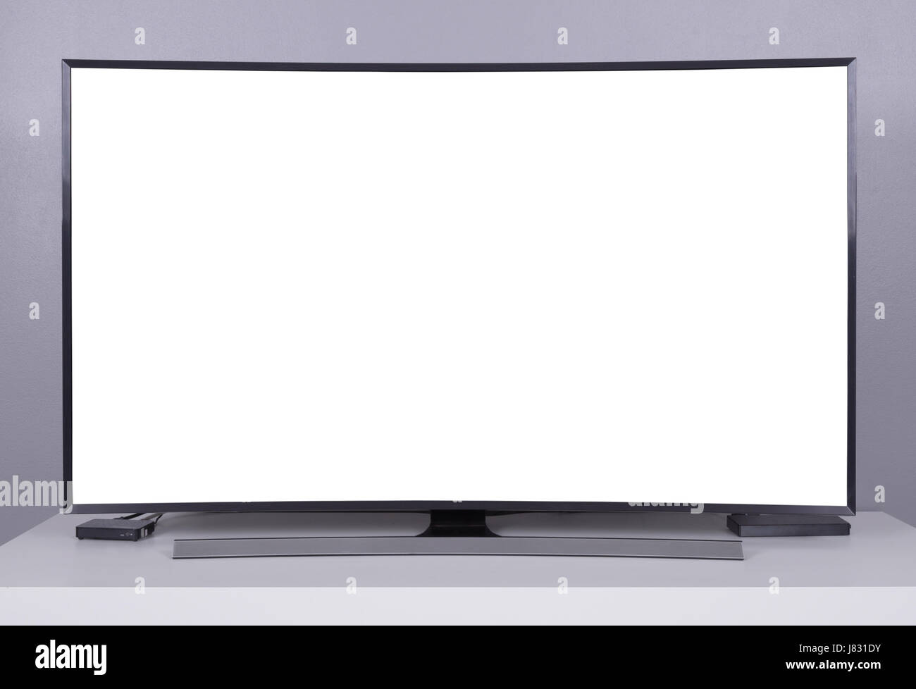 LED TV with blank screen on white stand Stock Photo - Alamy