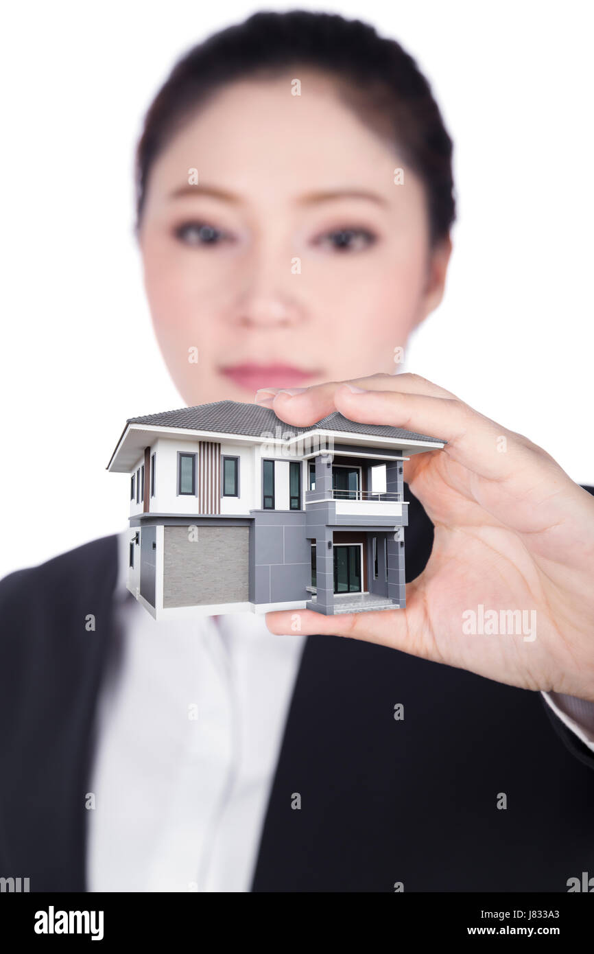 modern home in business woman hand isolated on white background Stock ...