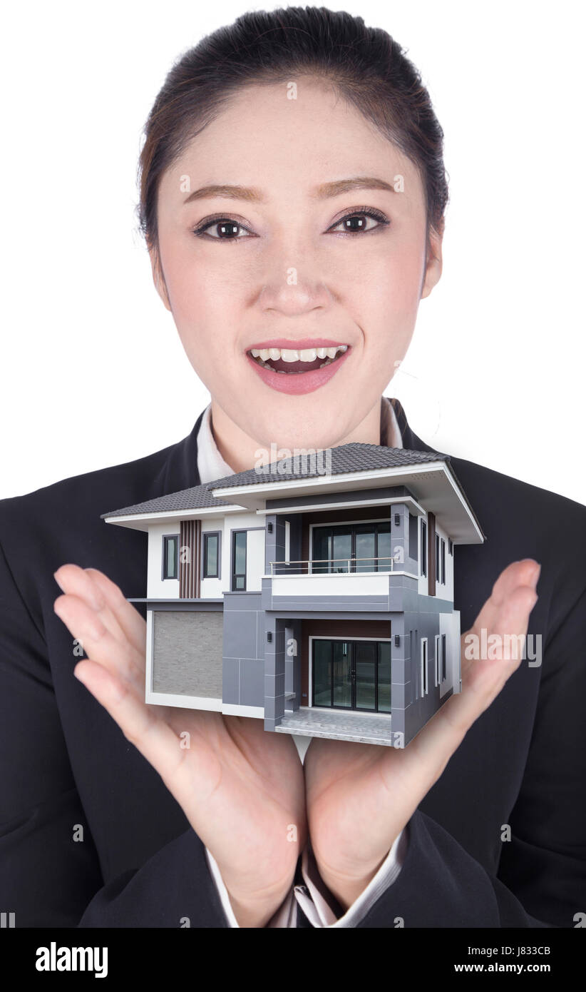 modern home in business woman hand isolated on white background Stock ...
