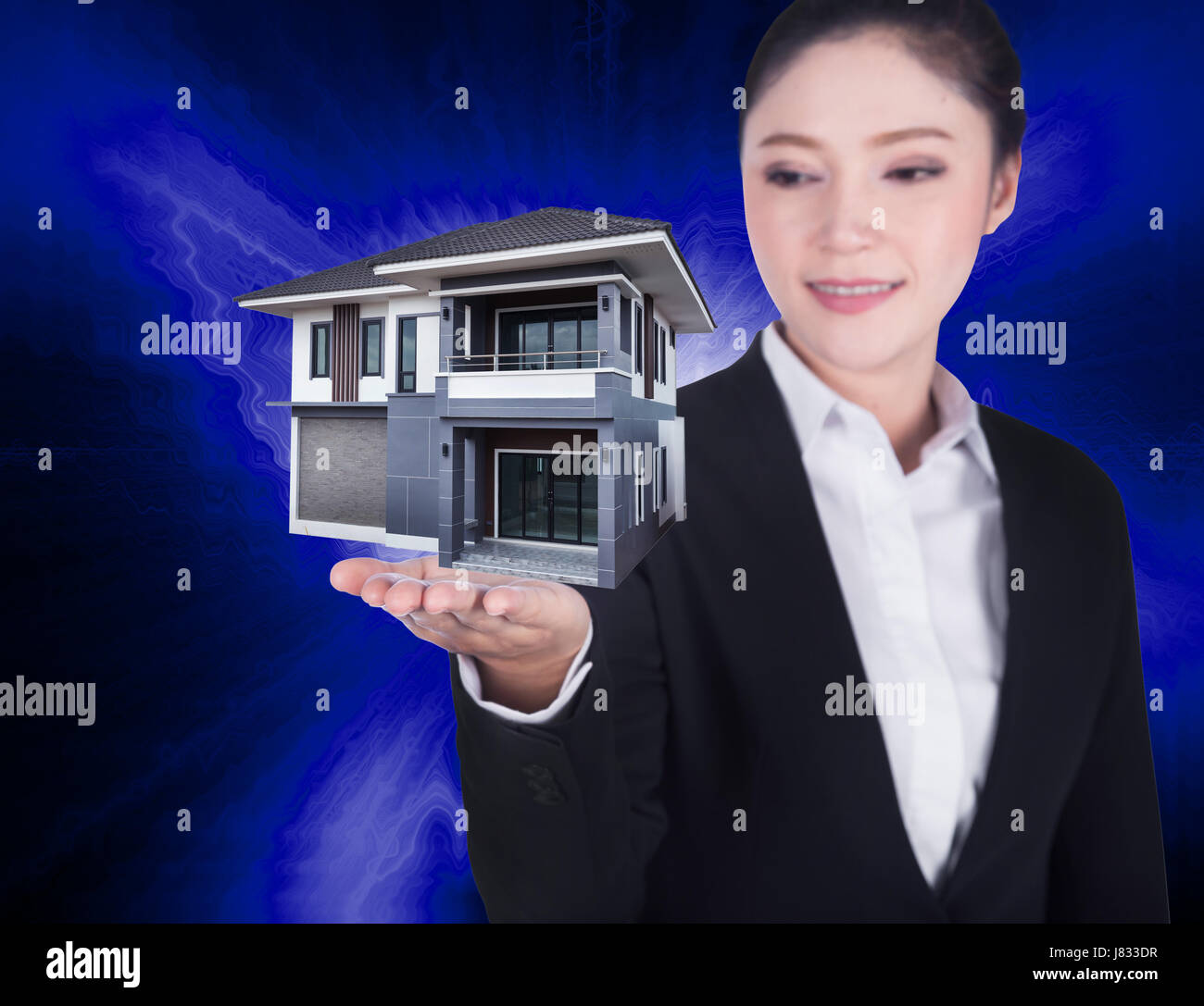 modern home in business woman hand Stock Photo - Alamy