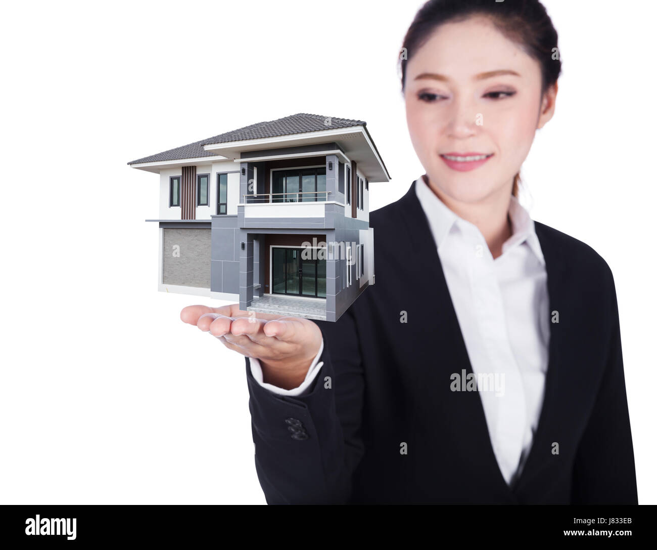 modern home in business woman hand isolated on white background Stock ...