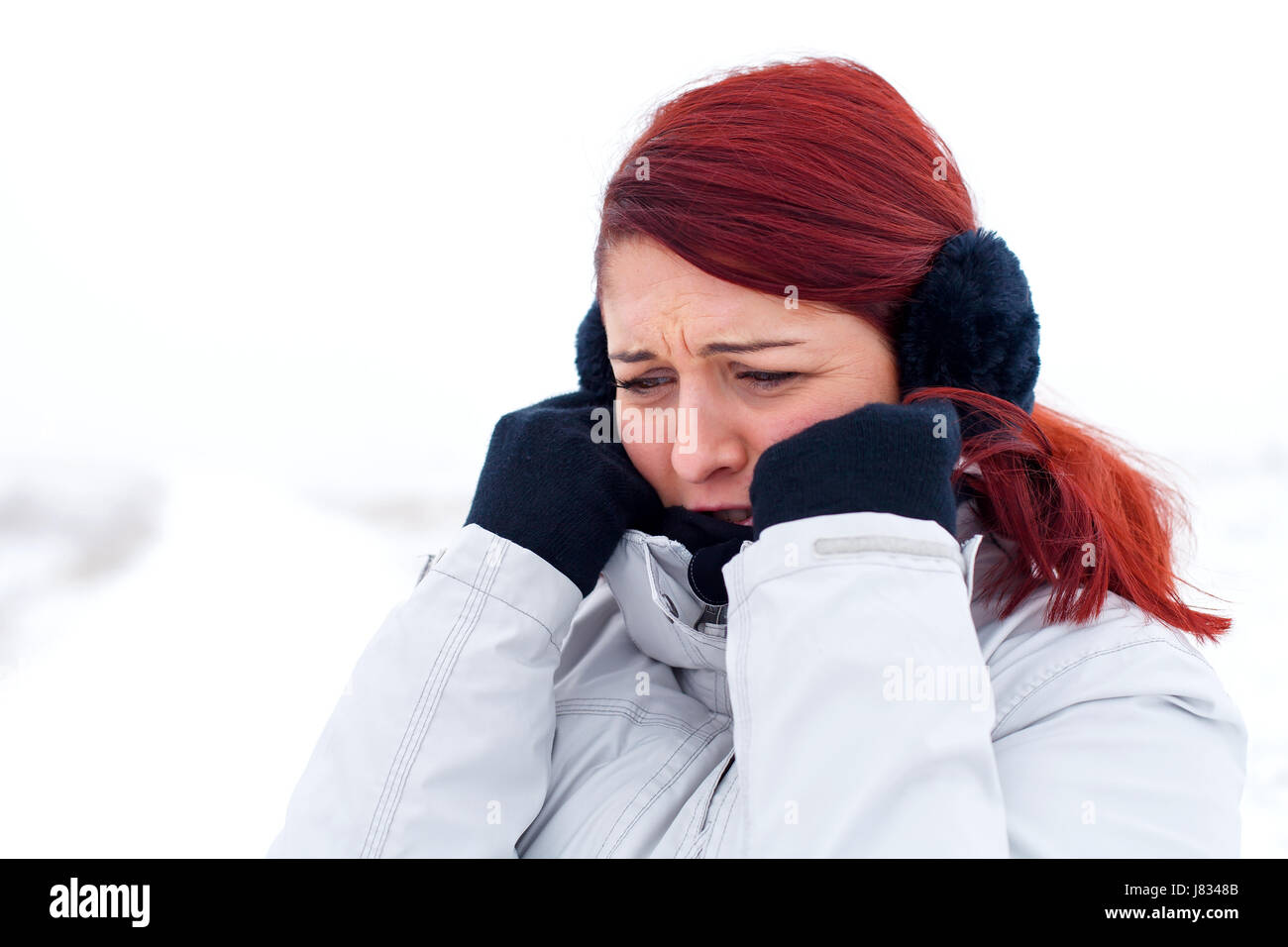 Portrait of a beautiful lady feeling cold on wintertime Stock Photo - Alamy