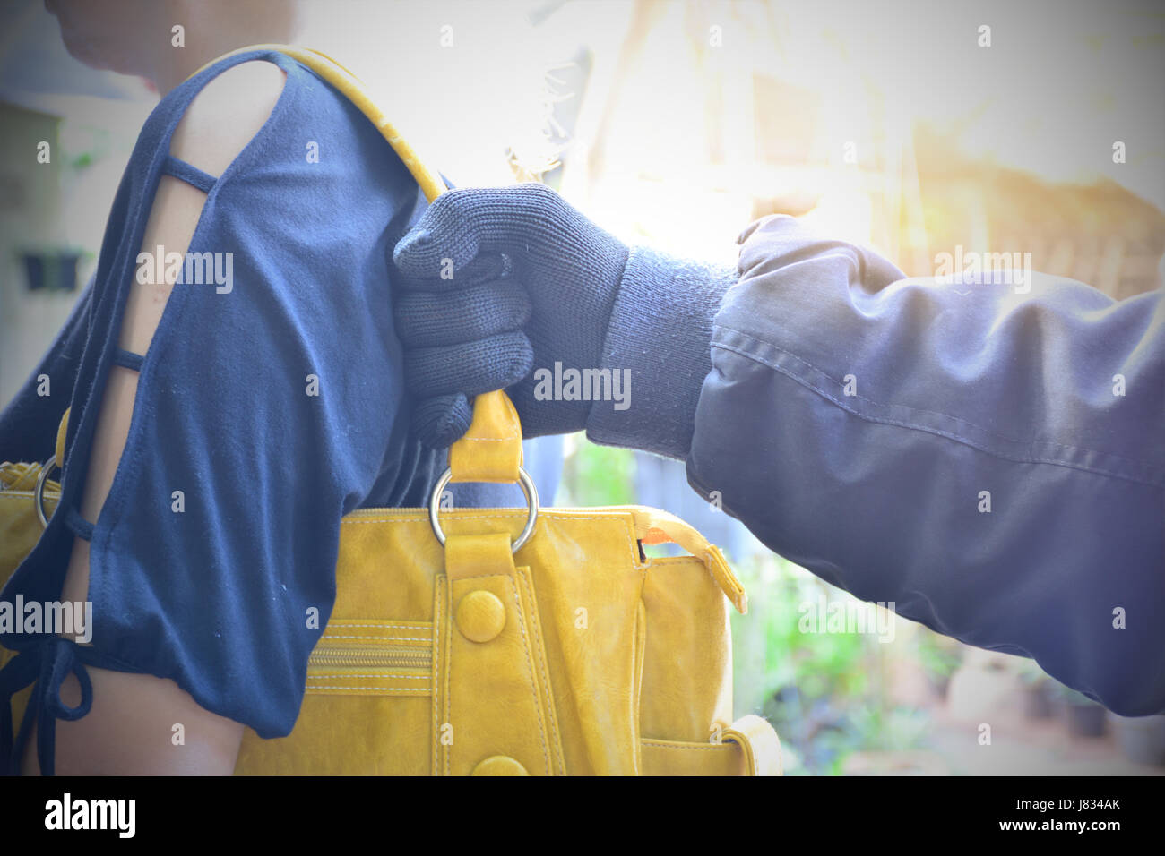 Bag snatching hi-res stock photography and images - Alamy