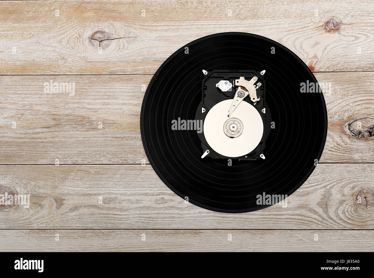 vinyl disc and hard disk, Data record concept Stock Photo - Alamy