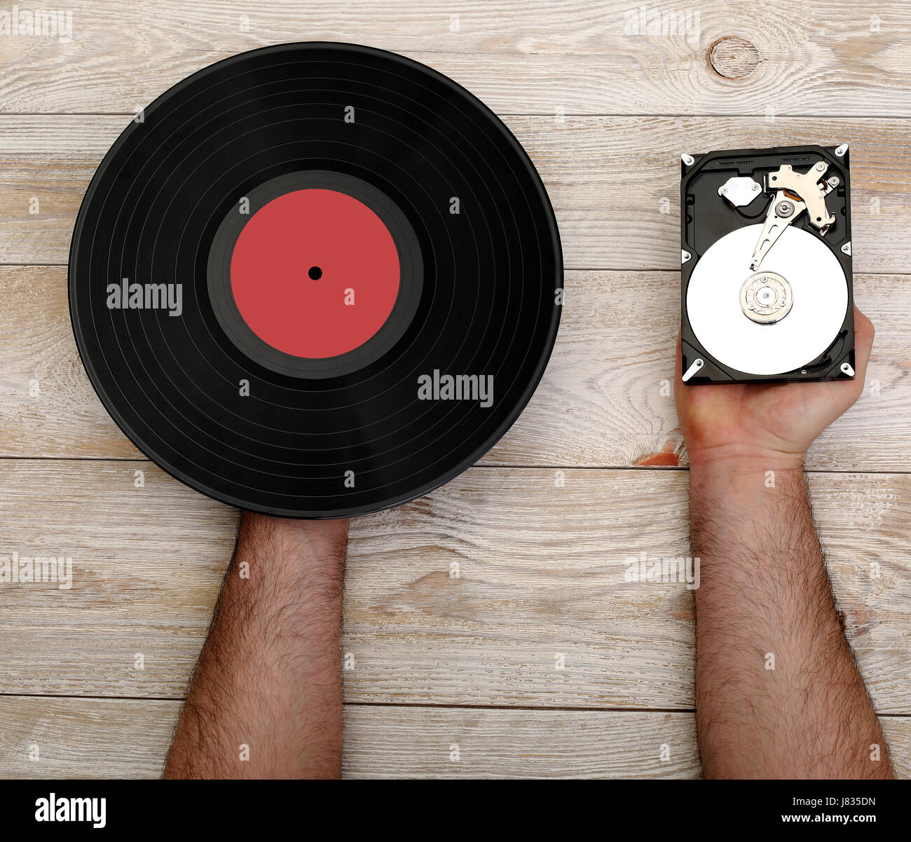 vinyl disc and hard disk, Data record concept Stock Photo - Alamy