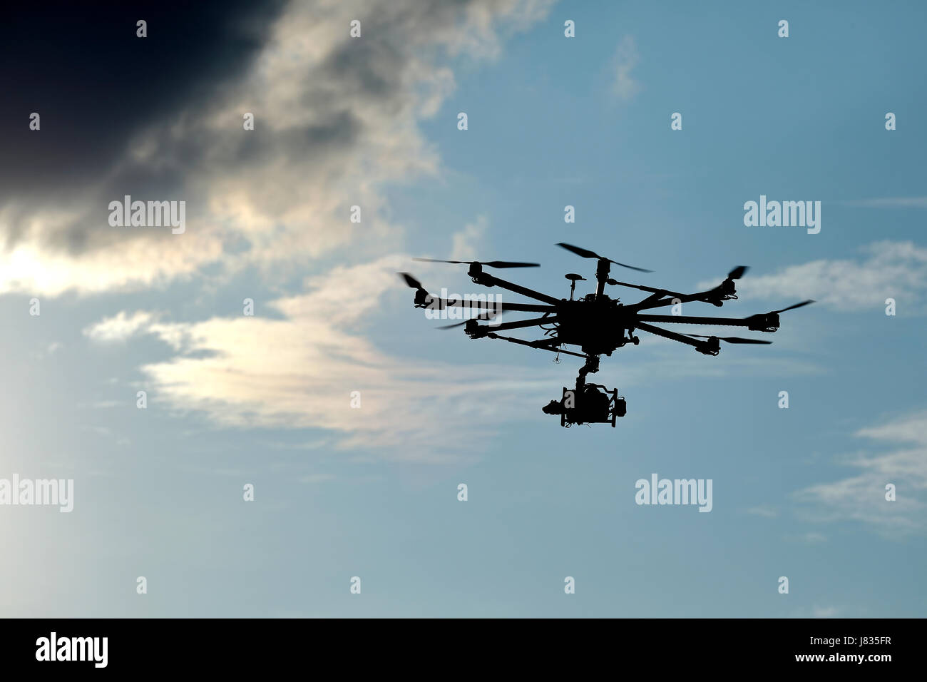 Drone, Unmanned copter flight, pilot flying drone Stock Photo - Alamy