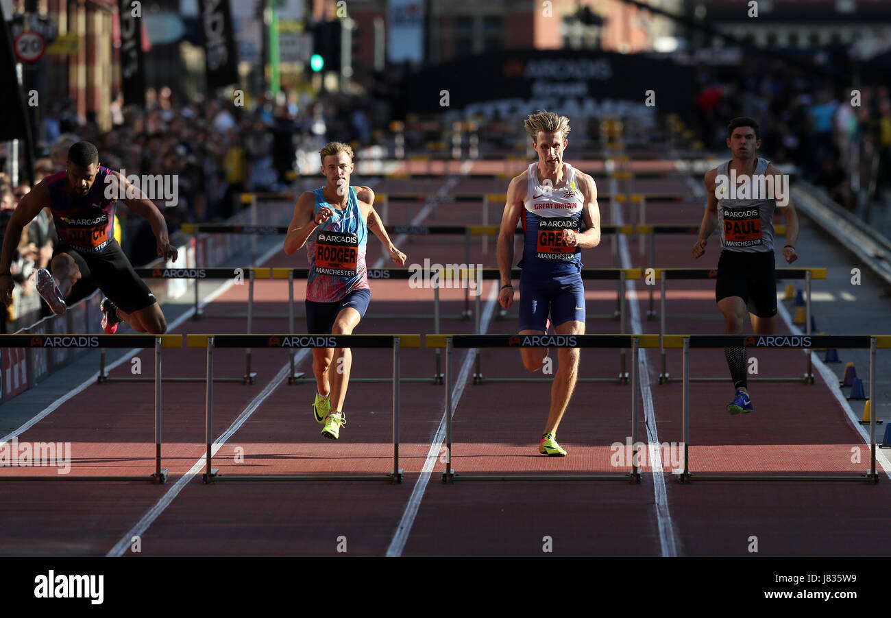 Johnny Dutch (left) before winning the Men's 200m Hurdles ahead of ...