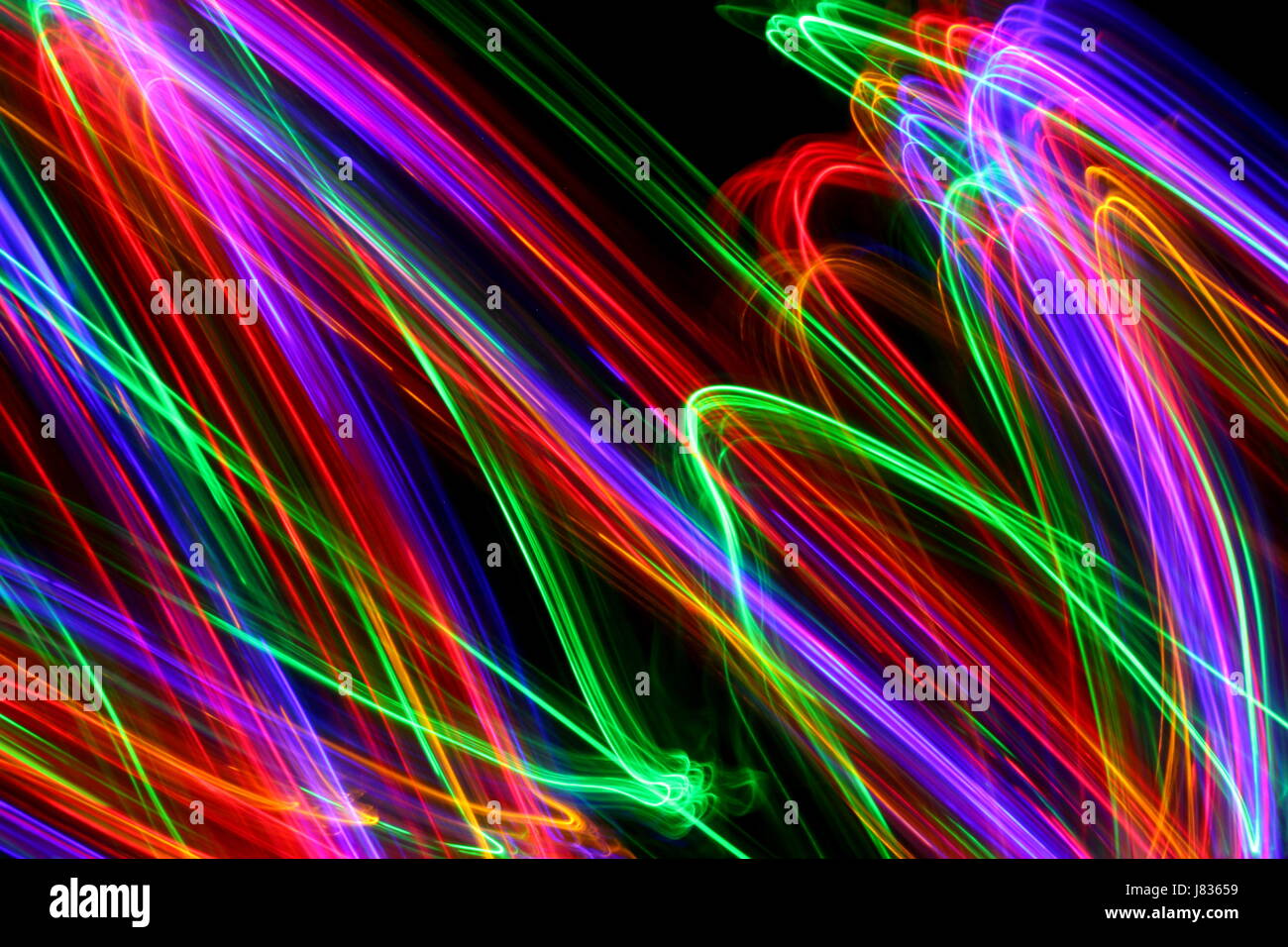 Multi Coloured Light Painting Photography, swirls and loops against a ...