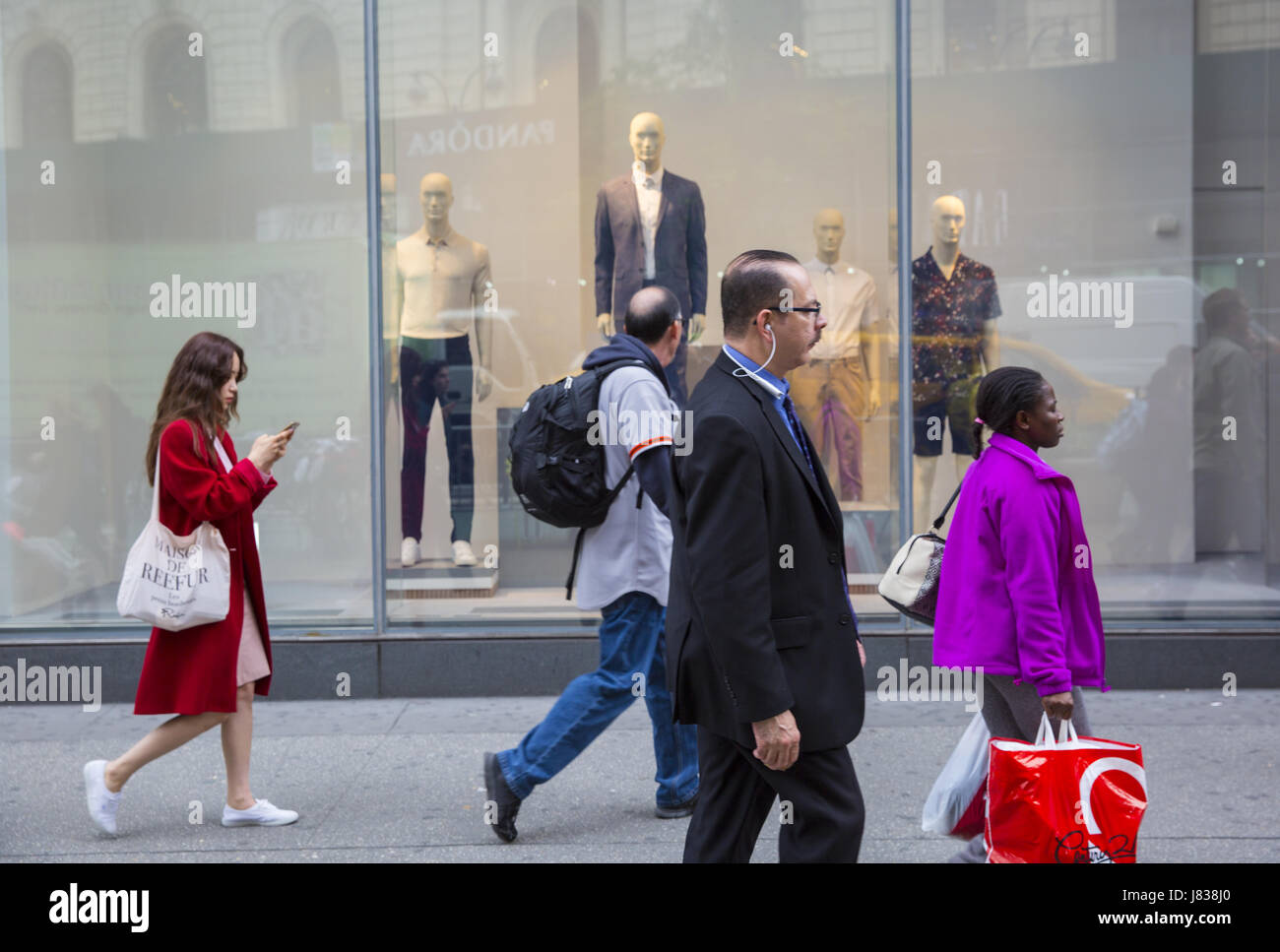 People constantly flow by a JC Penney Department Store at Manhattan ...