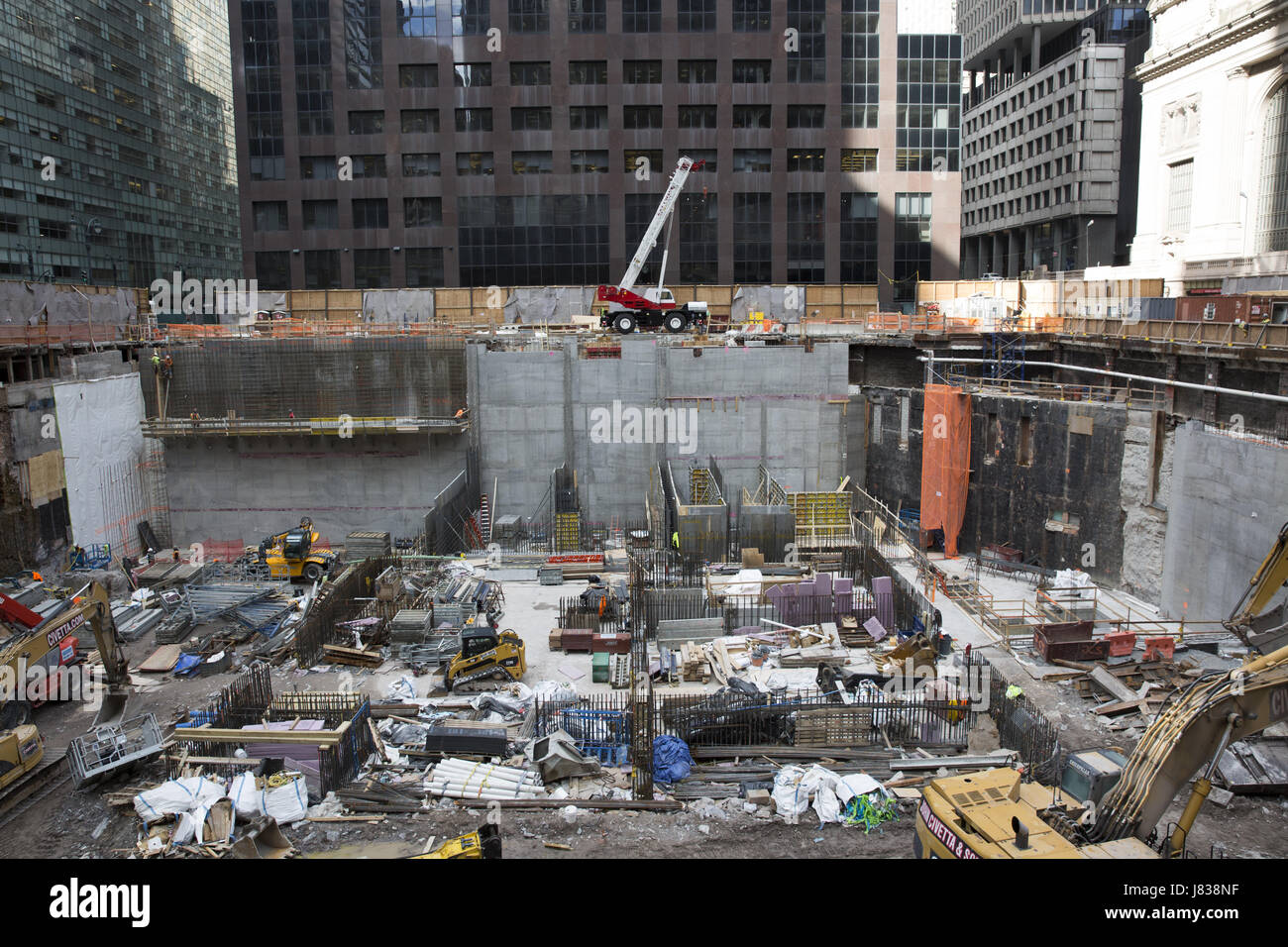 Preparing a deep foundation for another midtown tall building going up ...