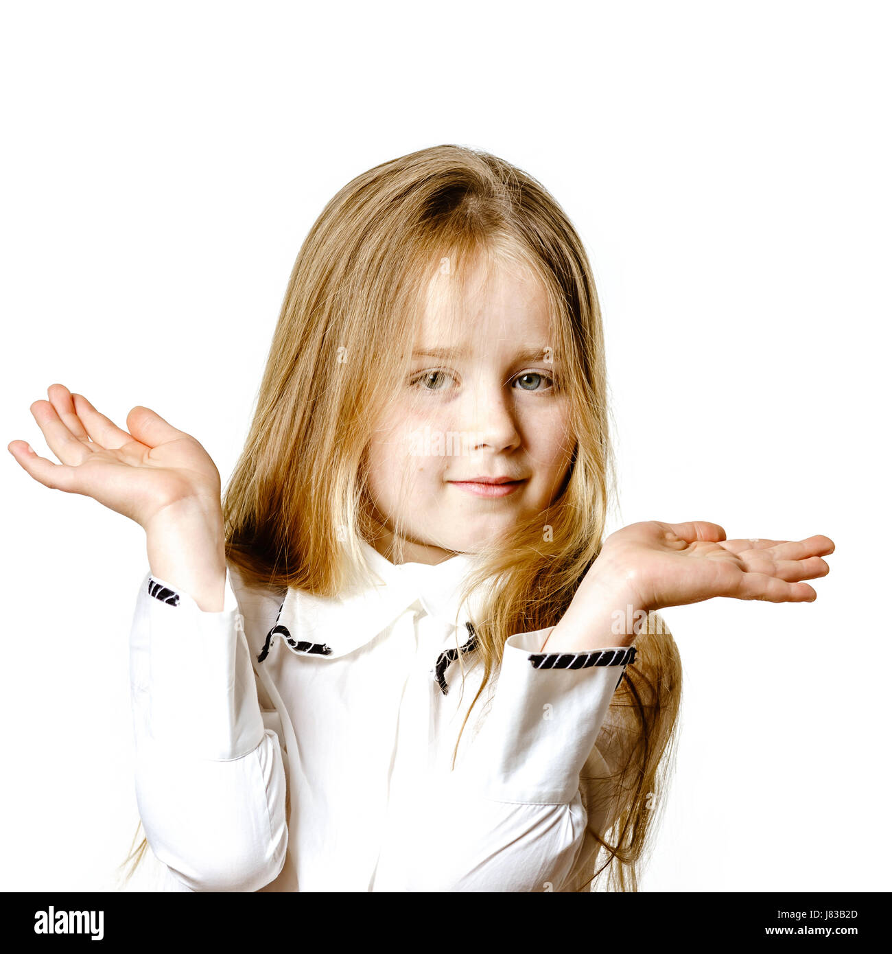 Cute little girl posing for advertising, making signes by hands and ...