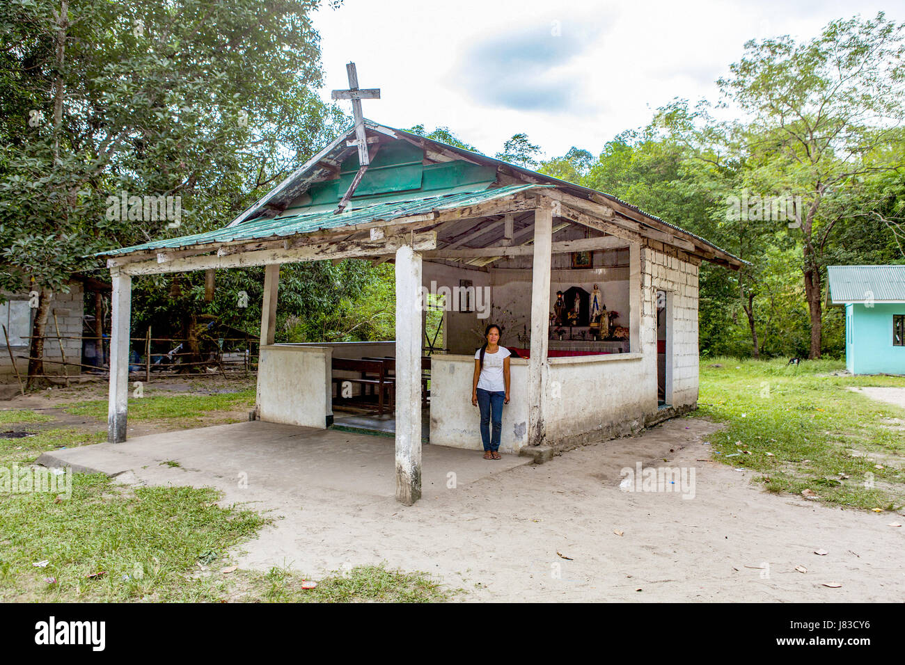 A poor but loved Christian church is stewarded by a female Filipino ...