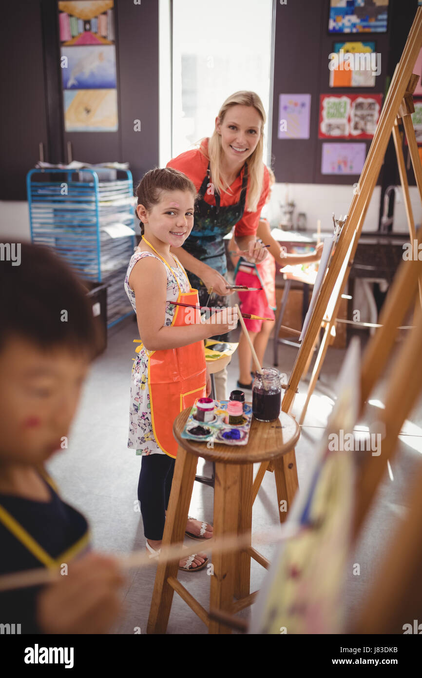 Boy and girl drawing in class hi-res stock photography and images - Alamy