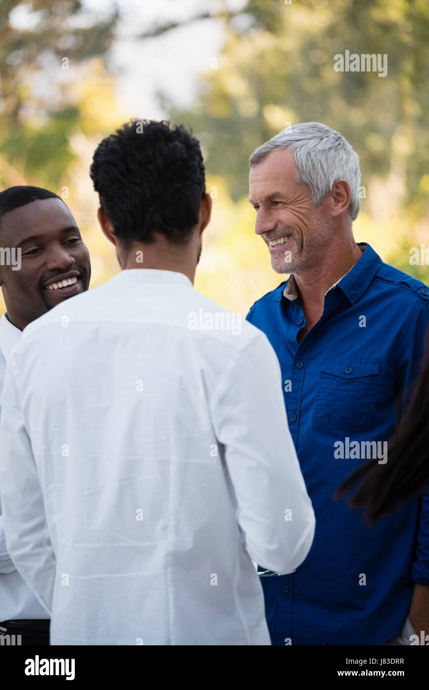 Happy male friends having fun during at bar Stock Photo - Alamy