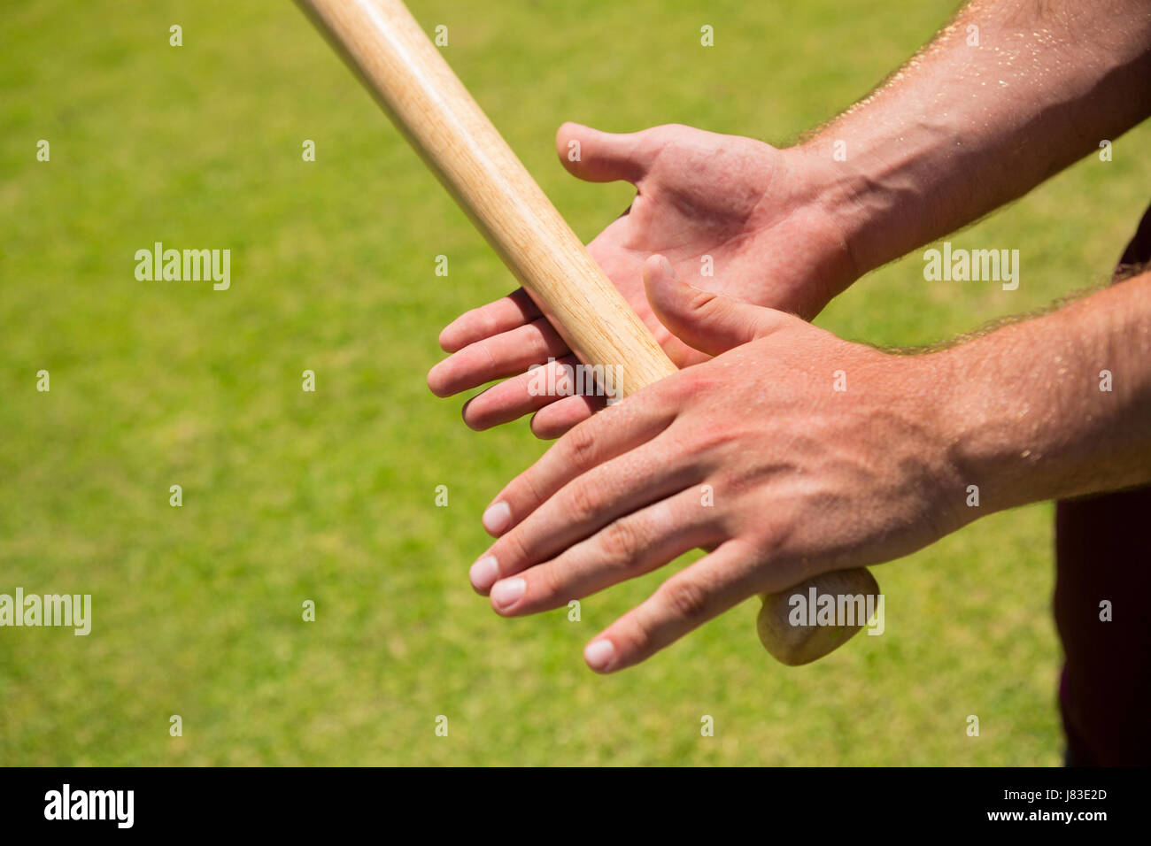 Hands holding bat hi-res stock photography and images - Alamy