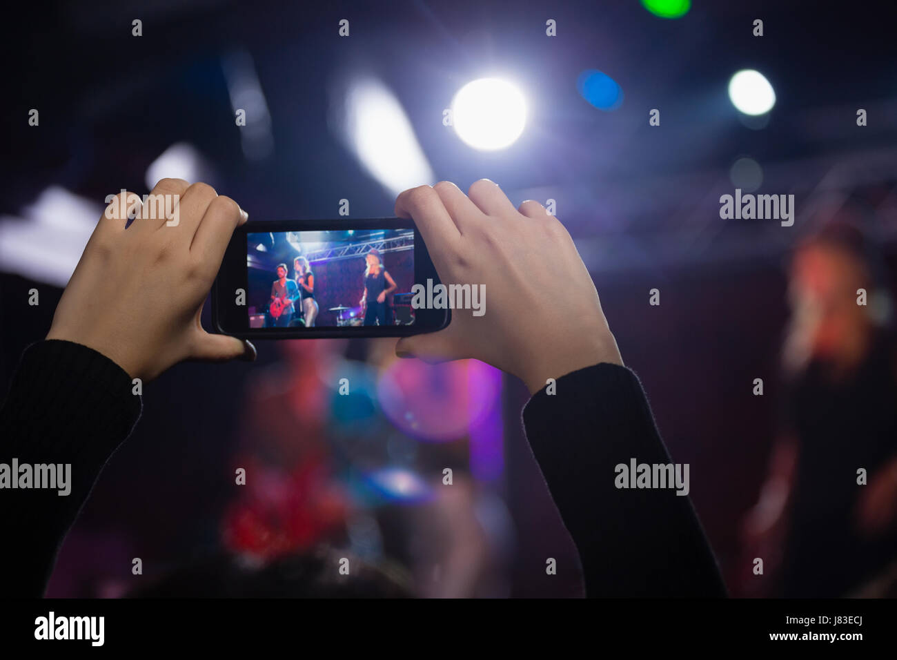 Recording Event With Her Phone Stock Photos & Recording Event With Her ...