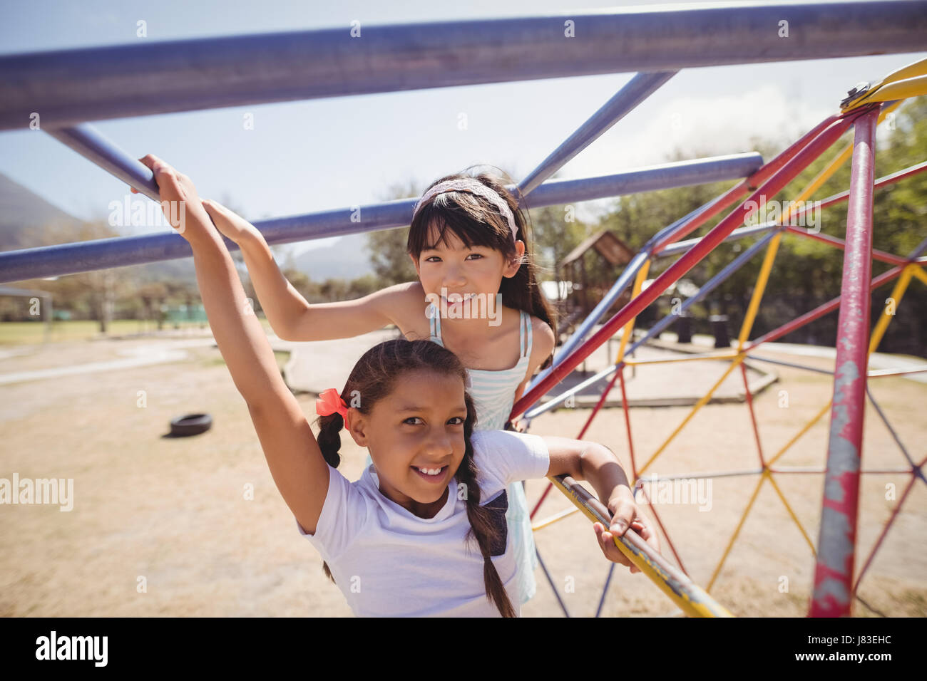 School girls playing in playground hi-res stock photography and images ...