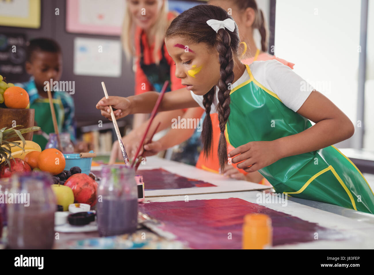 Schoolkids practicing drawing in school Stock Photo - Alamy