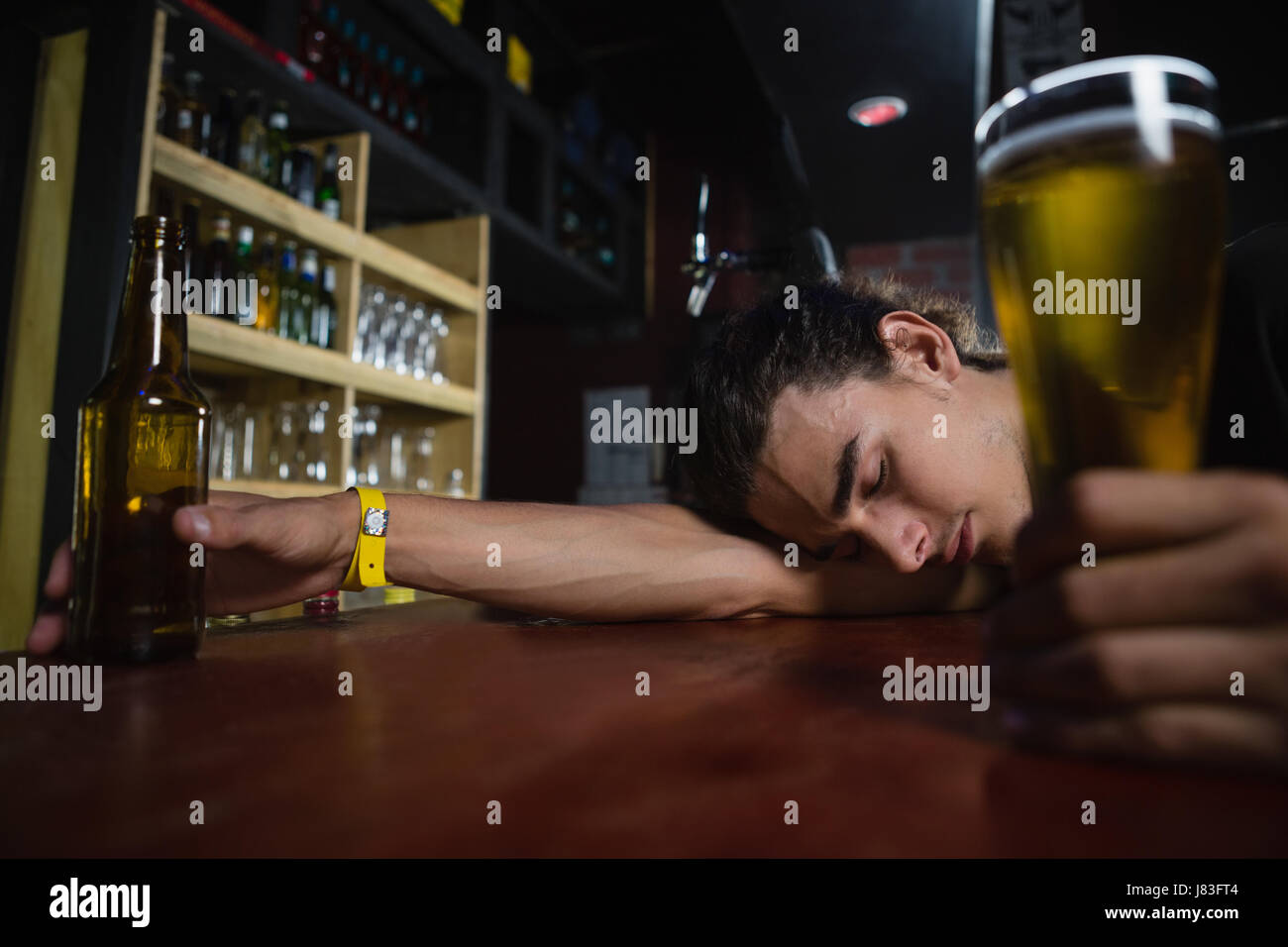 Drunk man sleeping bar hi-res stock photography and images - Alamy