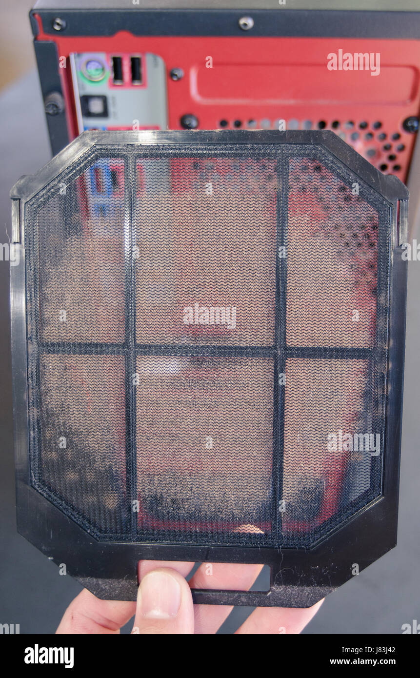 Computer case dust retainer full of dust Stock Photo - Alamy