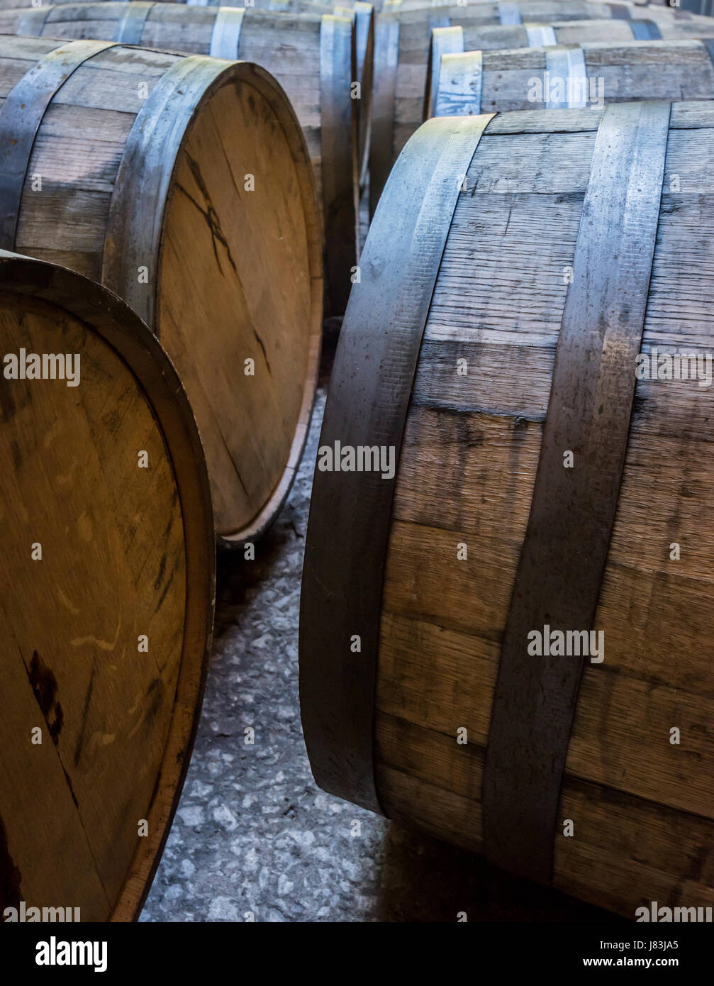 Old Bourbon Barrels Laying on Their Sides in storage Stock Photo - Alamy