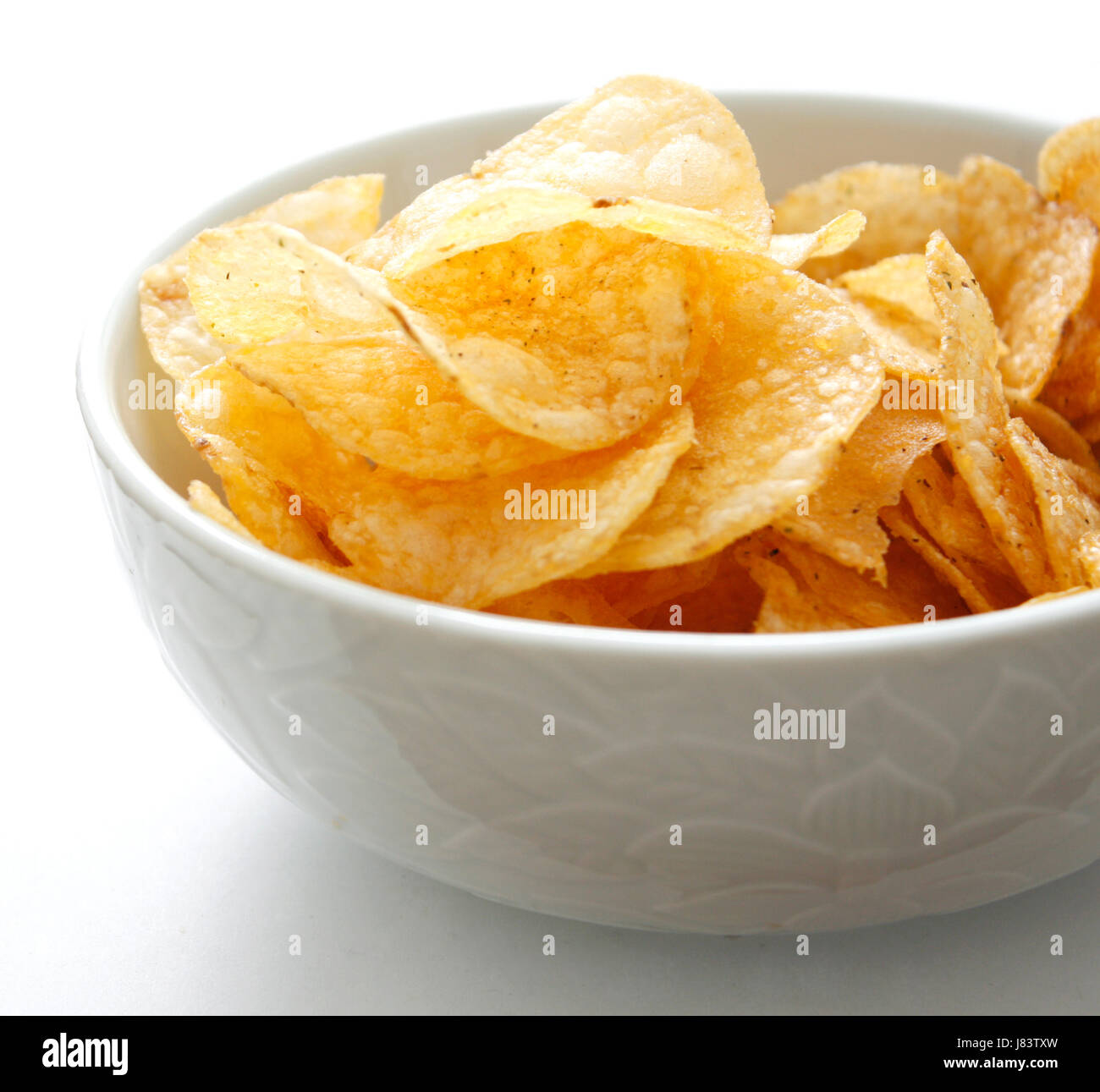 food aliment salt detail closeup golden plate diet greasy chip stack ...