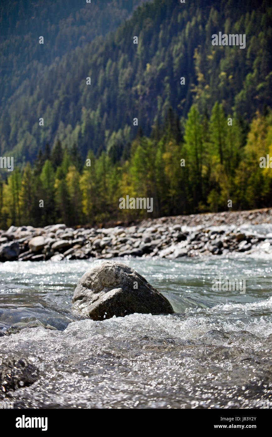 stone rock steadfast current of the river fresh water motion ...