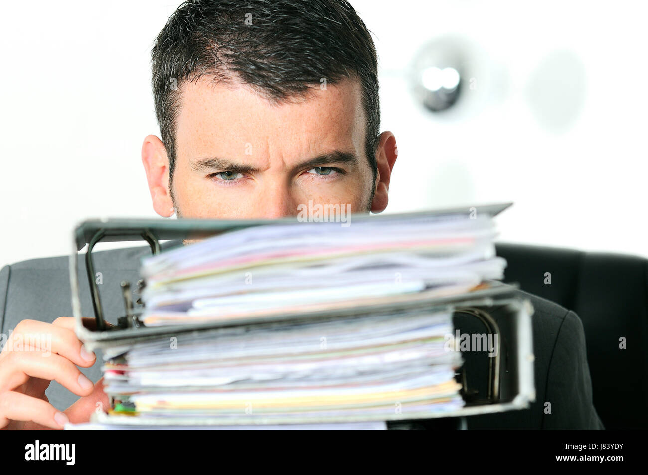 Hidden behind paperwork hi-res stock photography and images - Alamy