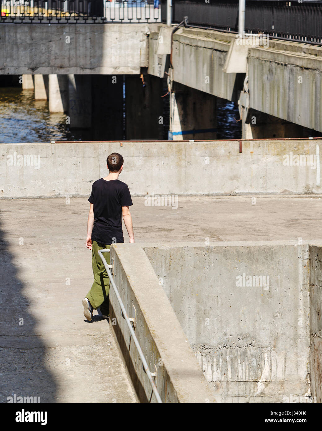 Guy walking on pier hi-res stock photography and images - Alamy