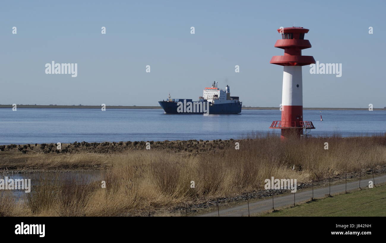 ship with lighthouse Stock Photo - Alamy