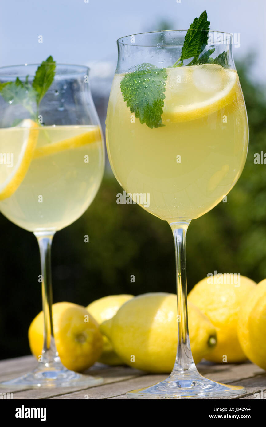 cocktails with lemons slices Stock Photo - Alamy