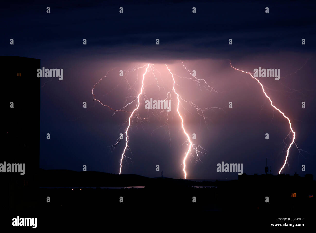 blue dramatic lightning sheet lightning flash pivots bolt abstract dark ...
