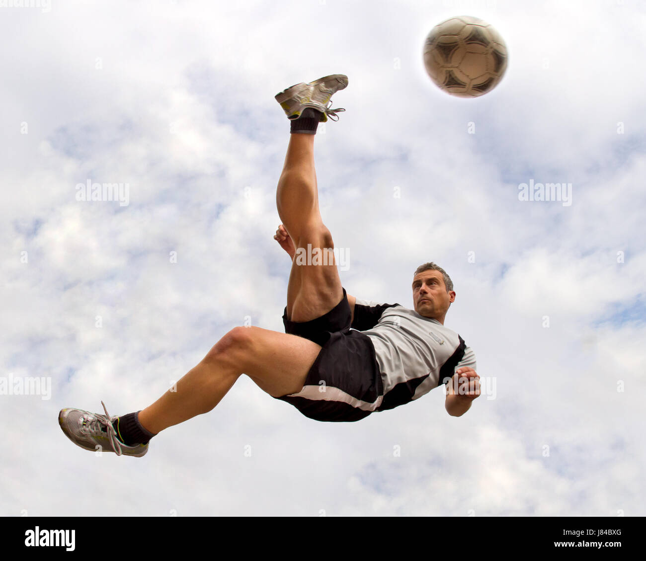 sport sports ball action falling overhead kick firmament sky soccer ...